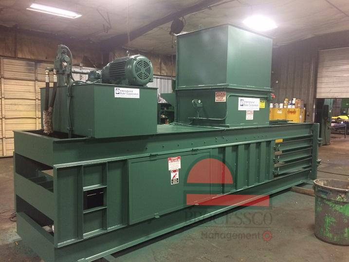 International Closed Door Horizontal Baler.
