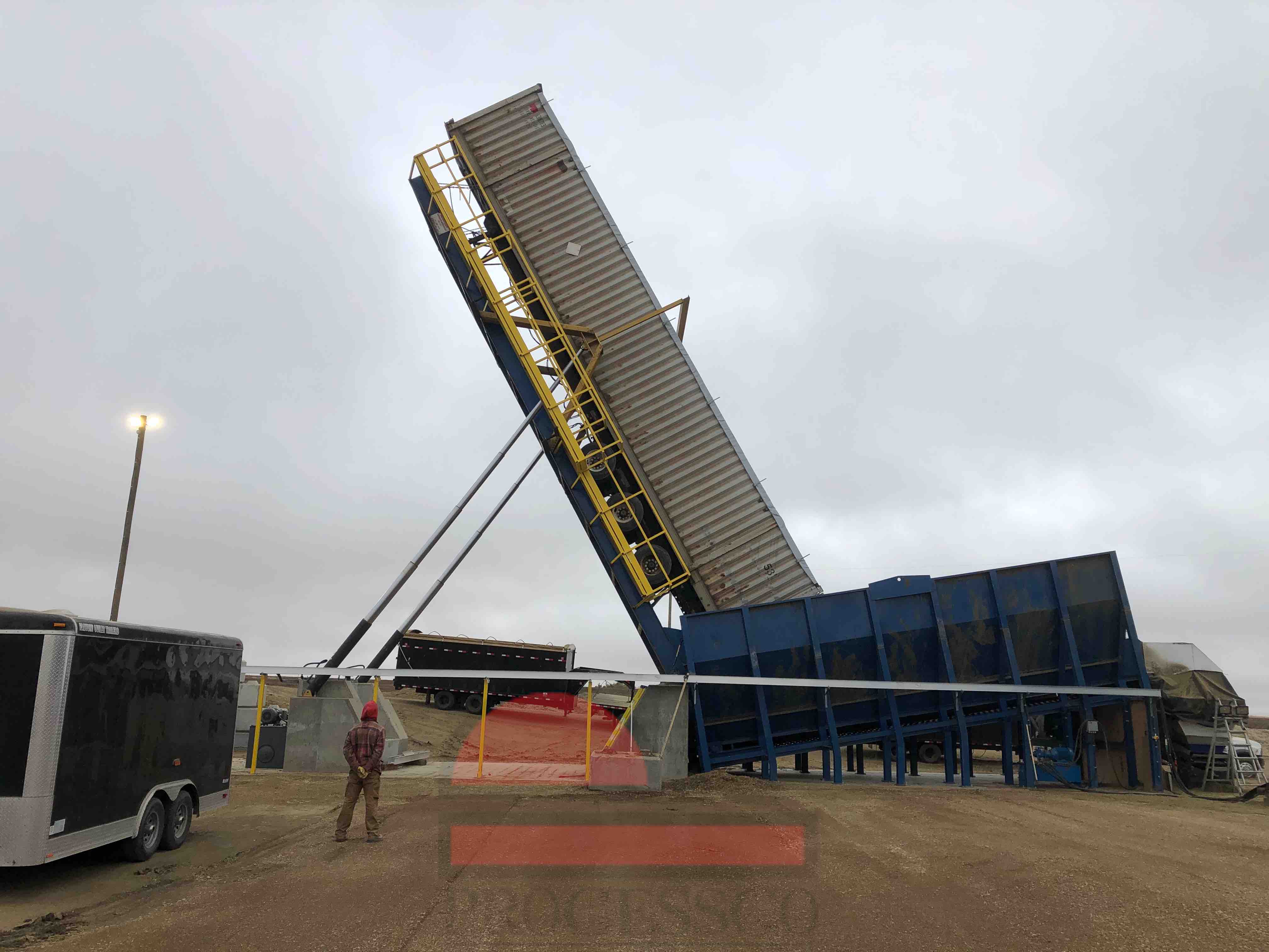 Stationary Chip Dumper Unloads 53’ Trailers